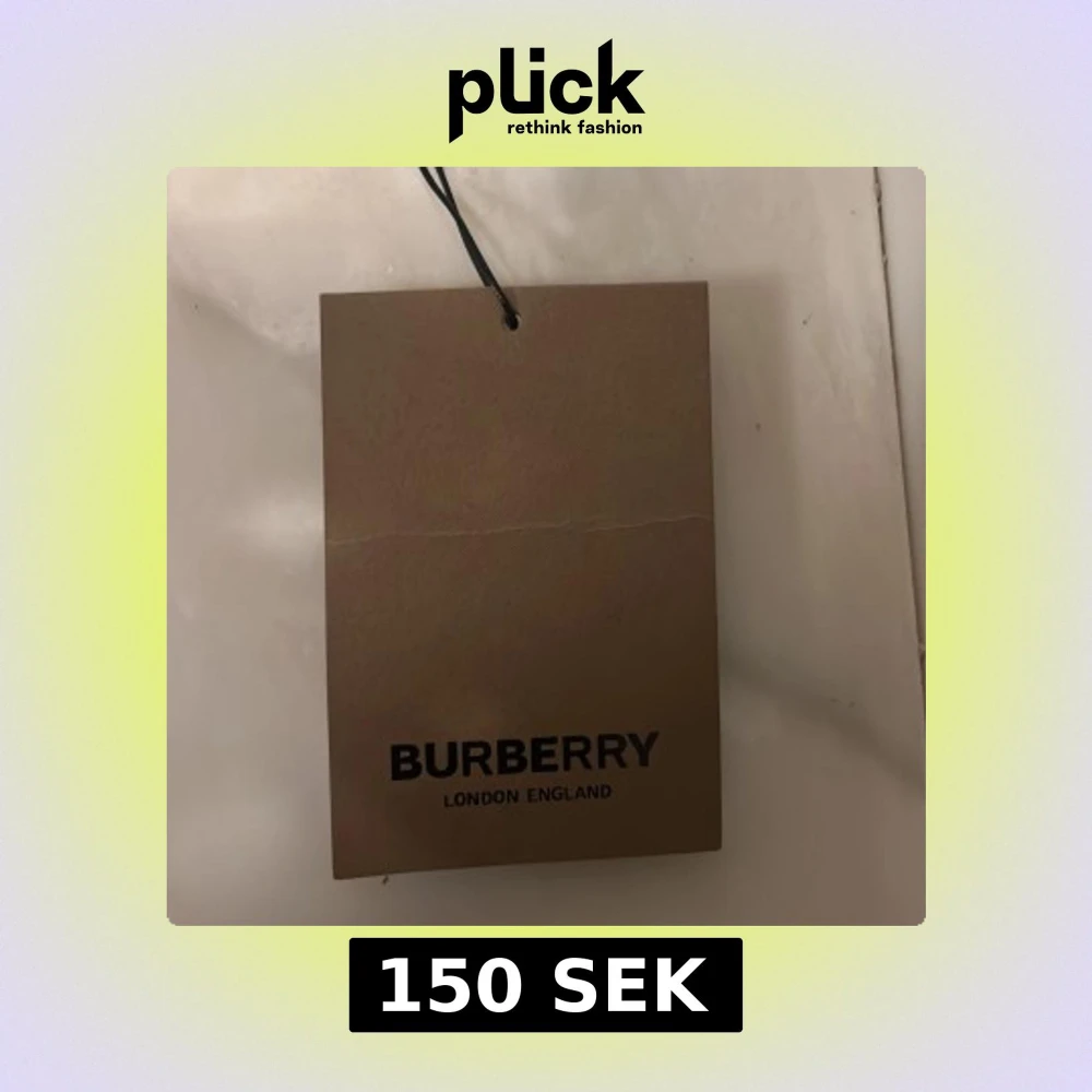 Svart Burberry Tag | övrigt
