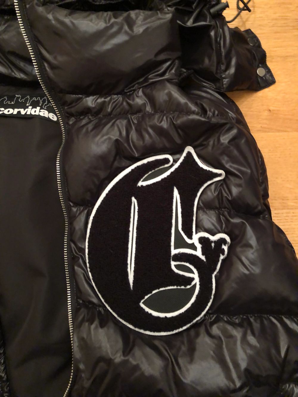 Corvidae puffer - Corvidae | Plick Second Hand