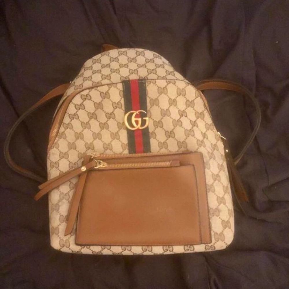 Brun A fake medium sized replica Gucci backpack | Plick