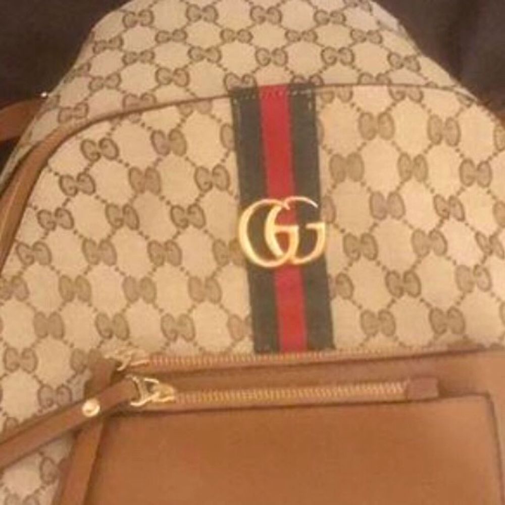 Brun A fake medium sized replica Gucci backpack | Plick