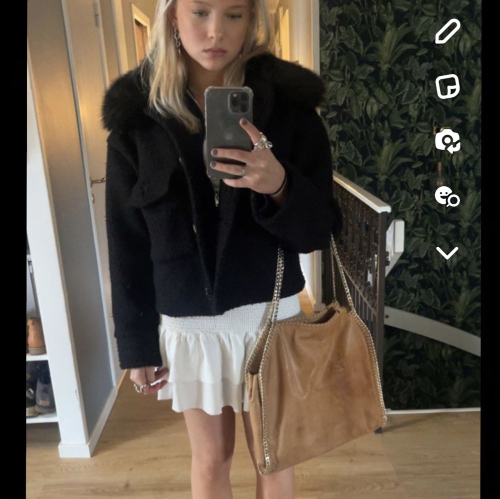 Svart meotine kappa - | Plick Second Hand