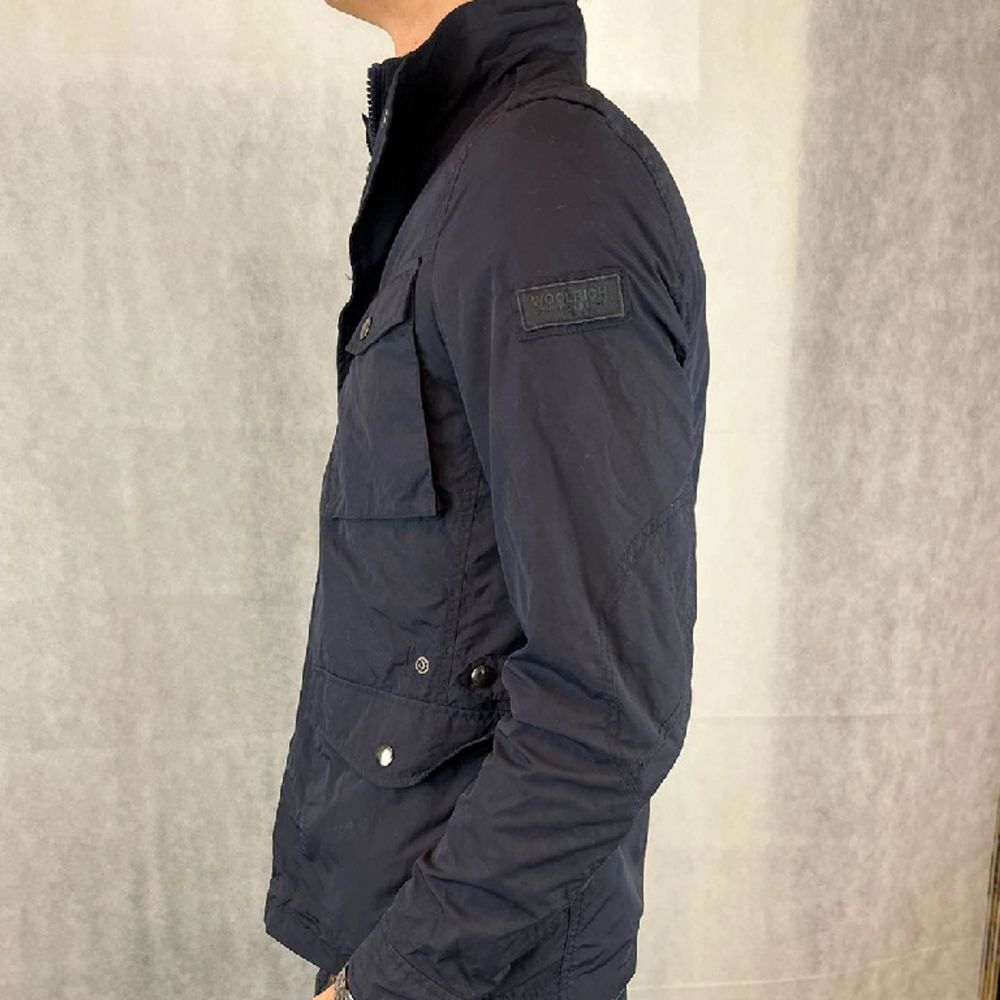 Marinblå Woolrich field jacket | Plick Second Hand